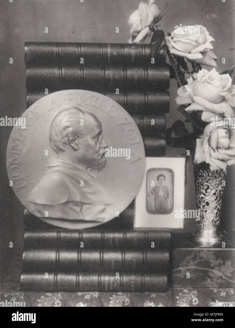 Photograph of a display featuring François Émile Zola's Rougon-Macquart ...