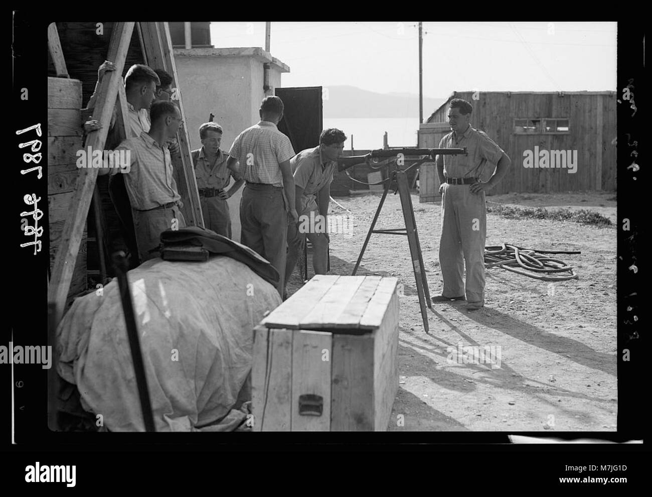 A historical photograph of Jewish settlers in Ain Geb, located on the ...
