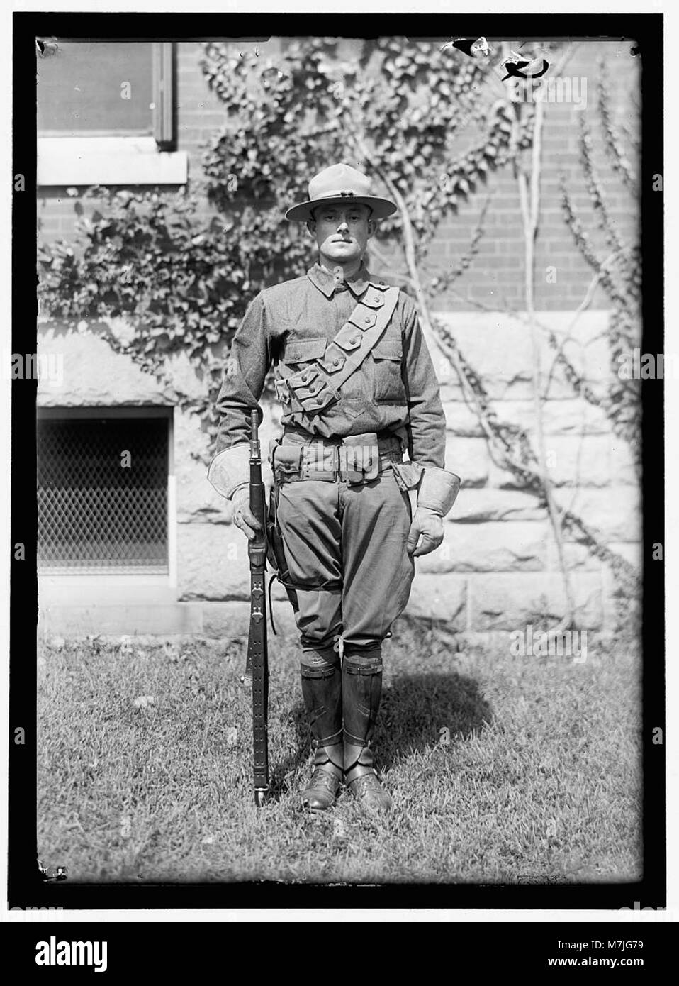This image shows a U.S. soldier equipped with standard military gear ...