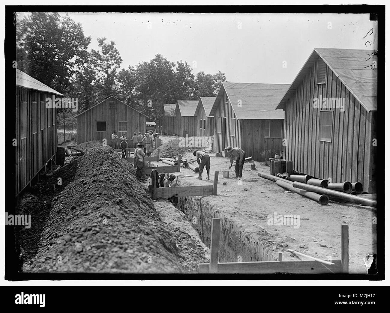 A photograph depicting a camp setting, likely from the early to mid ...