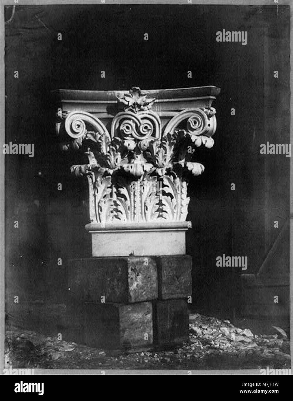 The image depicts a column capital, showcasing the detailed ...