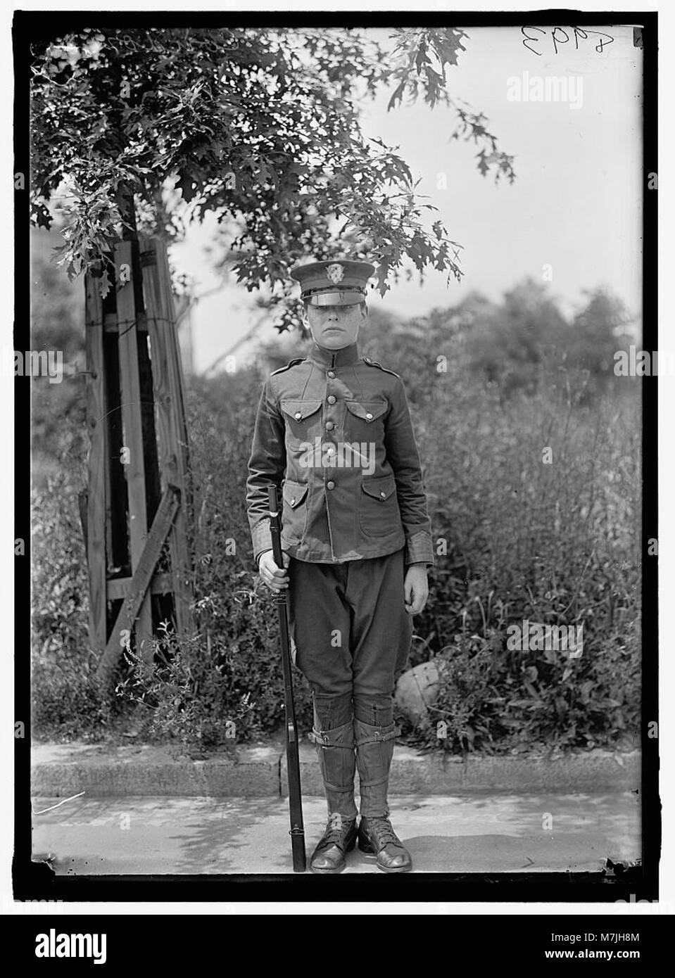A formal portrait of M.M. Condon, a junior American guard, captured as ...