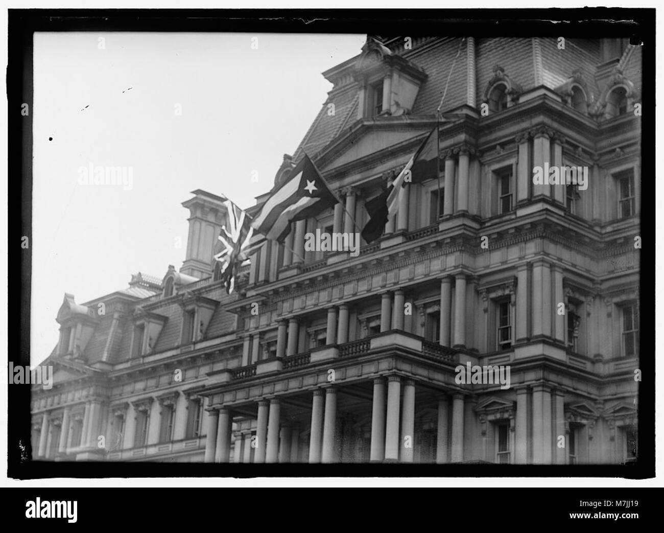 A photograph of American, British, and French flags displayed at the U ...