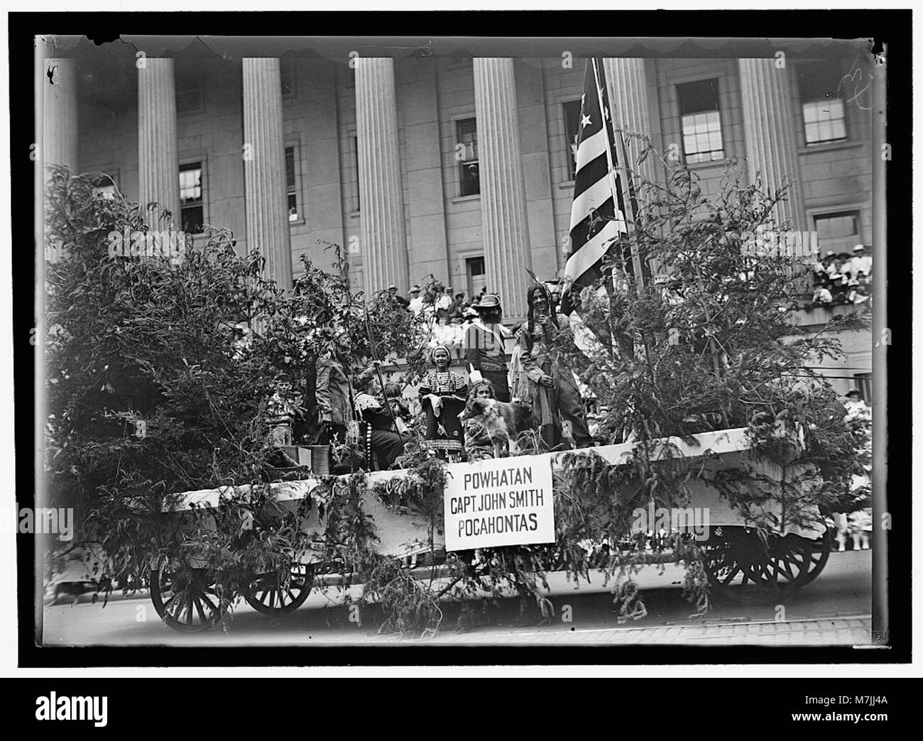 A float from a Fourth of July parade, featuring a colonial theme ...