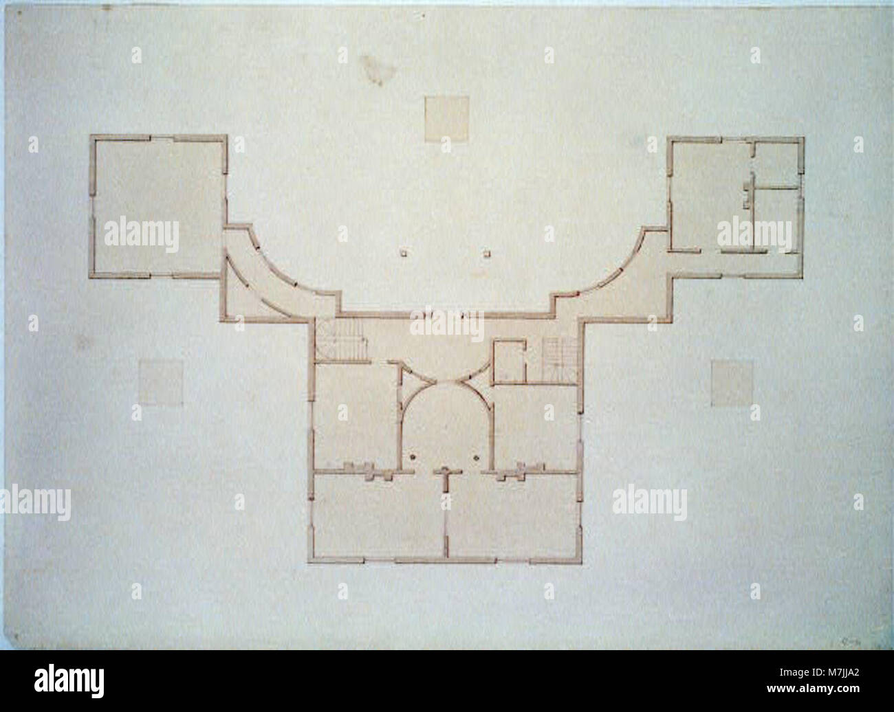 A detailed floor plan of a house featuring two advanced wings and ...