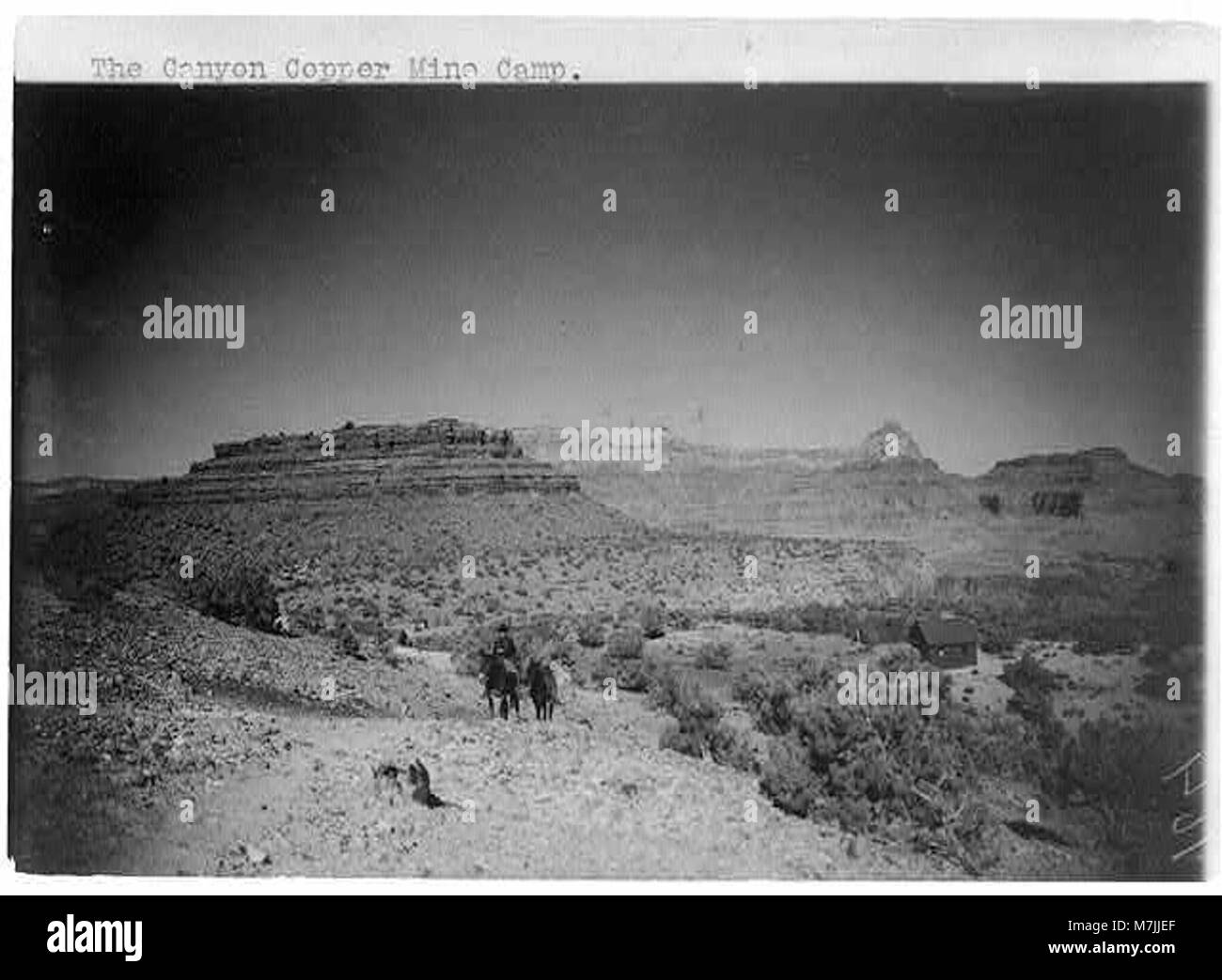 A historical photograph of the copper mine camp at the Grand Canyon, a ...
