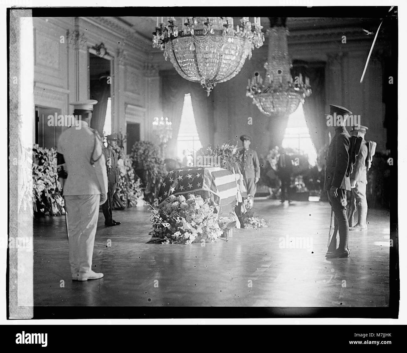 The image shows the funeral of President Warren G. Harding, a somber ...