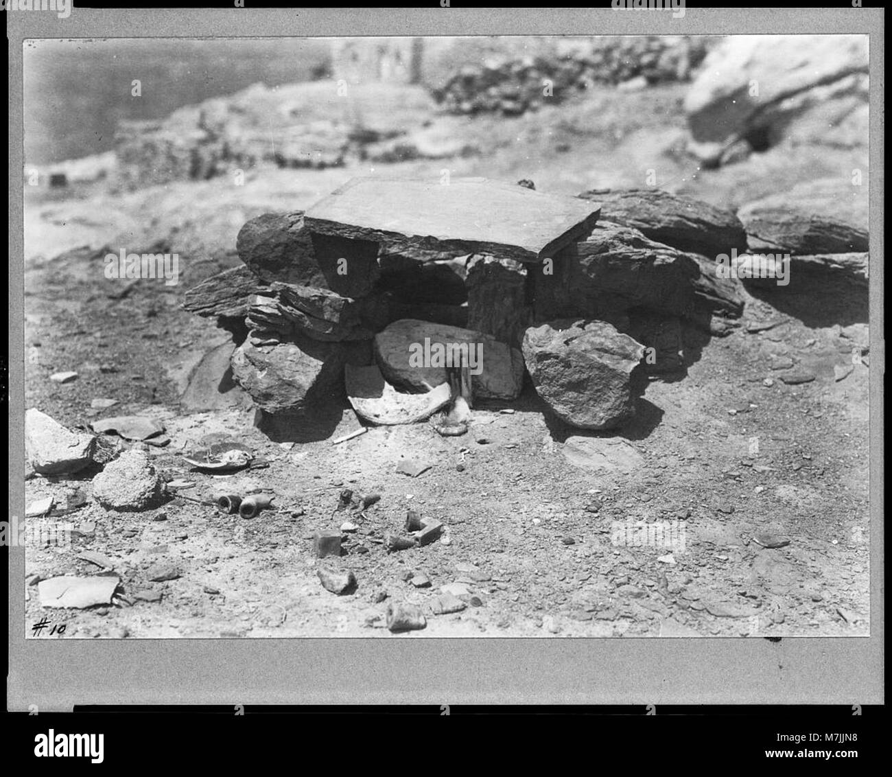 A photograph of a Hopi Indian's grave in Mishongnovi, Arizona. This ...