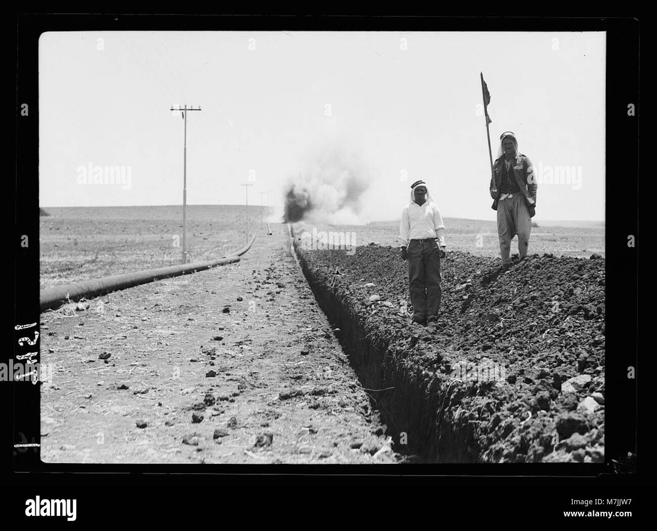 This image shows workers preparing a trench for a pipeline on Esdraelon ...
