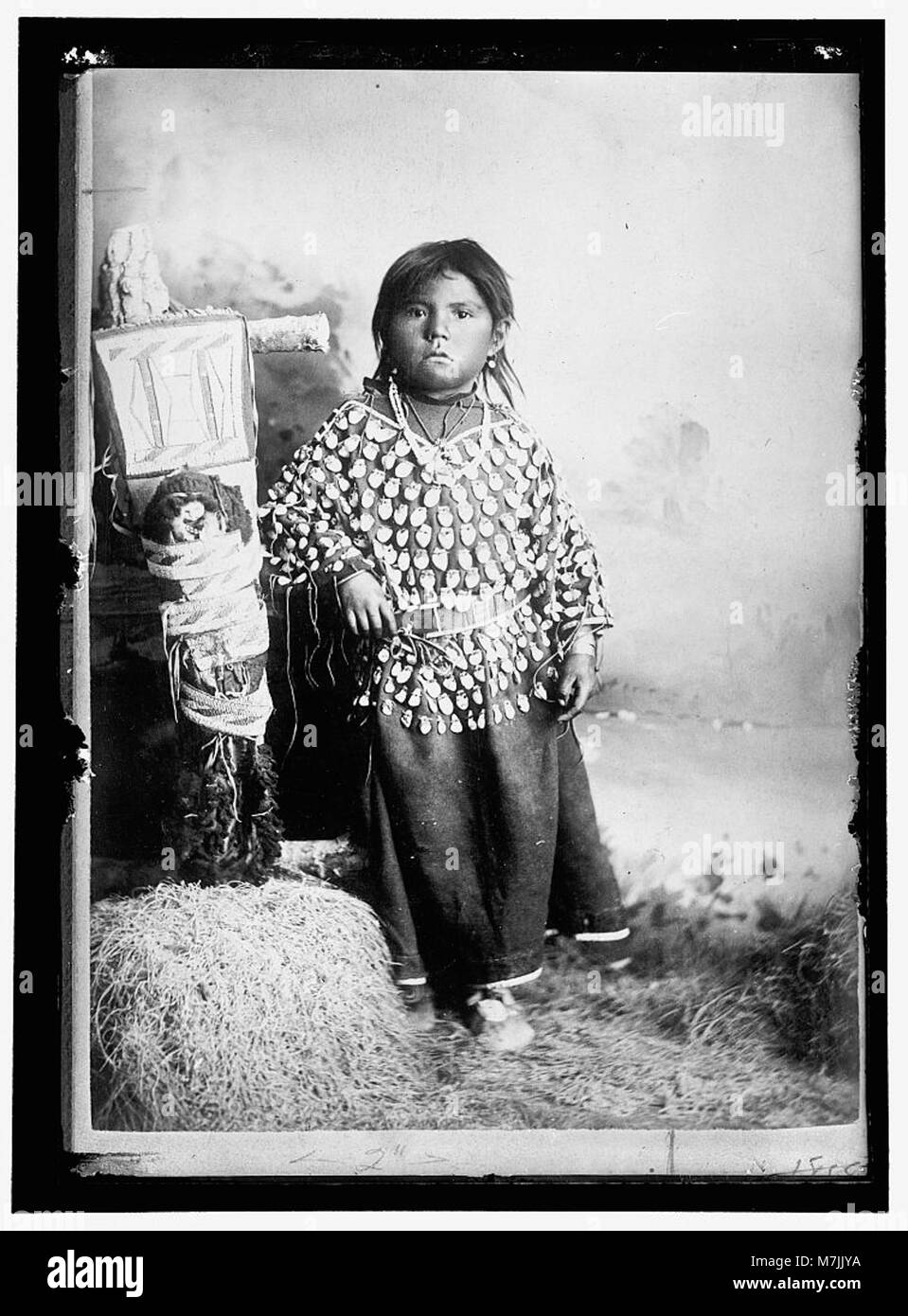 A photograph of an American Indian child, representing indigenous life ...