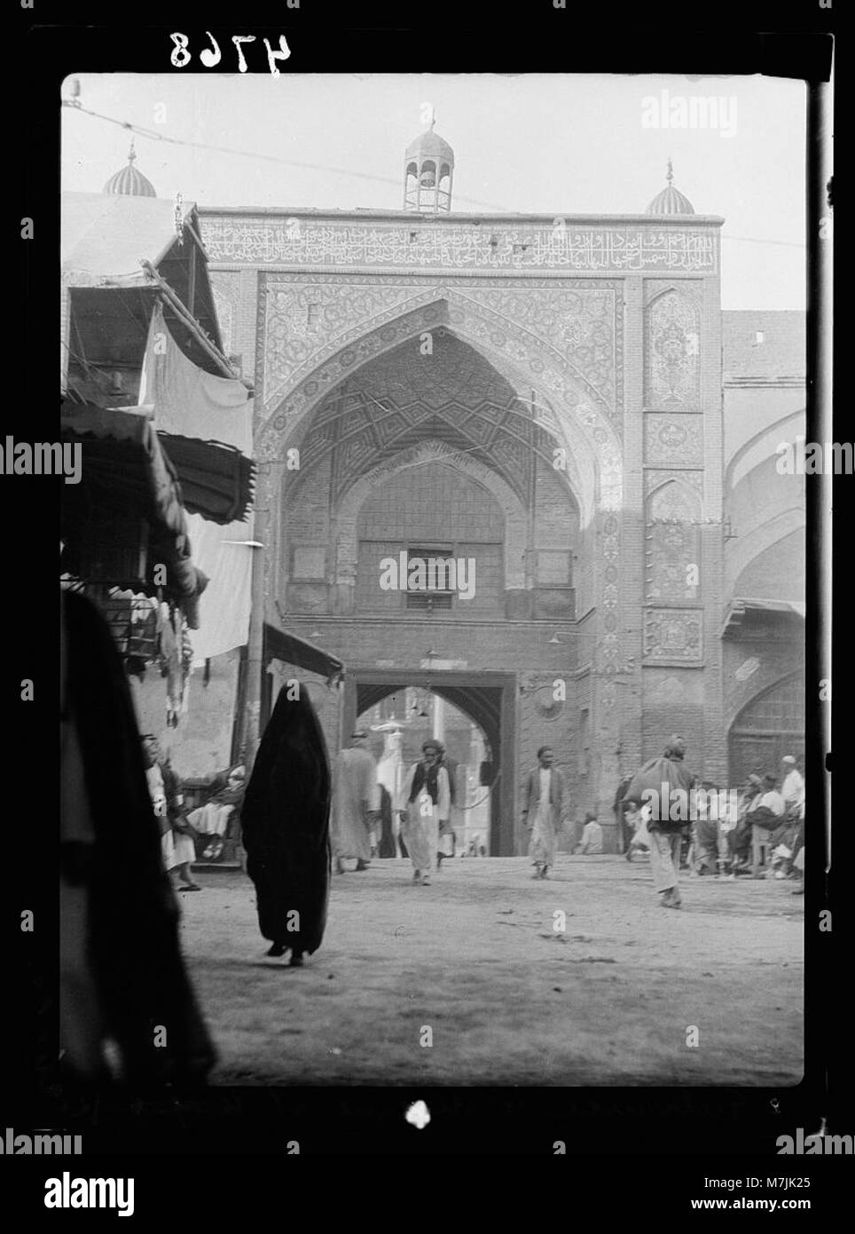 The entrance to the great mosque in Kerbela, Iraq, the second holiest ...