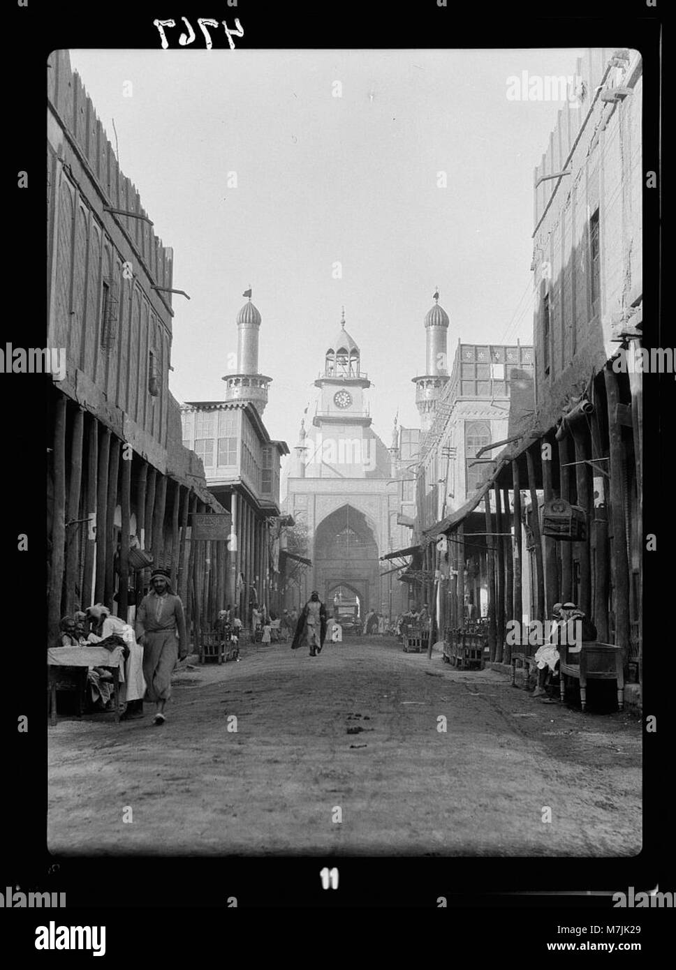 A street scene near the main entrance to the mosque in Kerbela, Iraq ...
