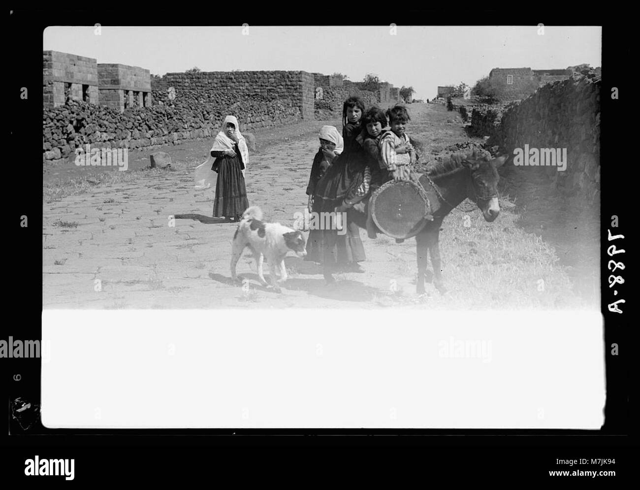 This photograph shows Druze children on a Roman street in Shahbah ...