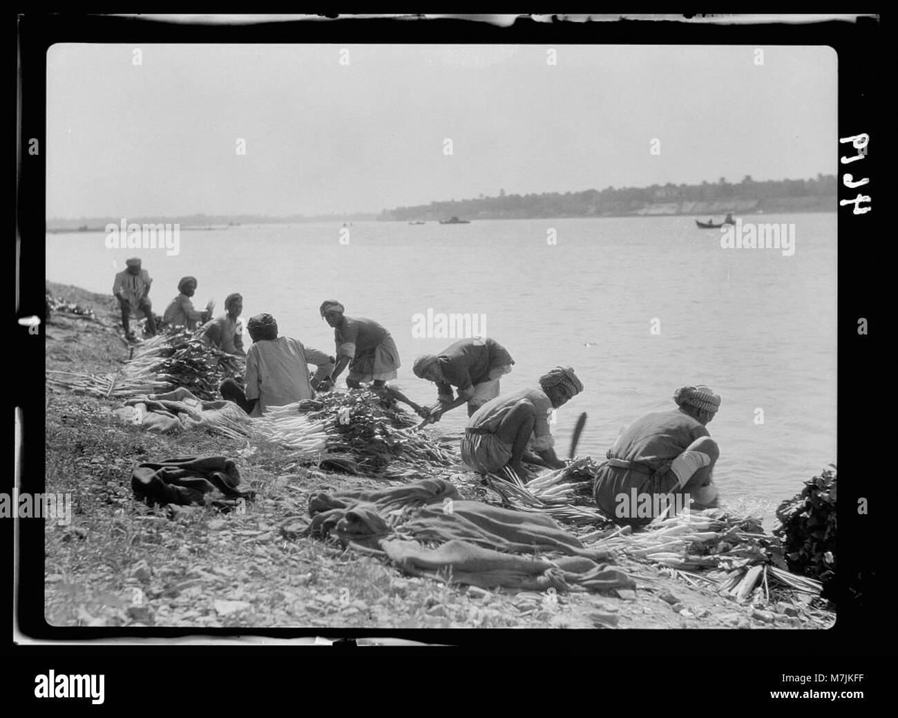 This image depicts daily life along the Tigris River in Baghdad, Iraq ...