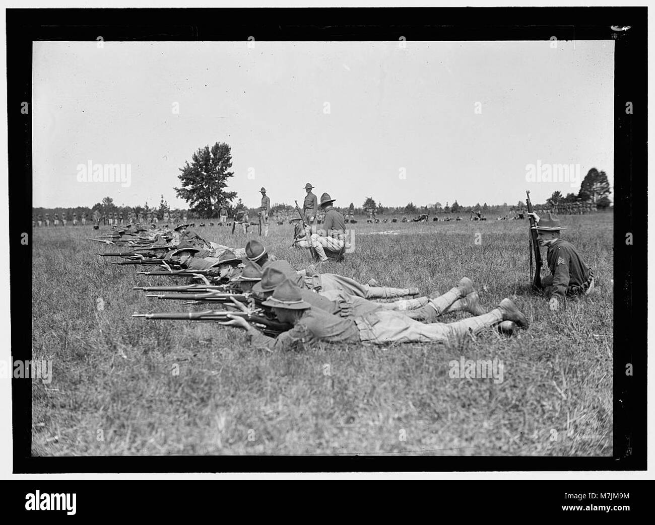 A historical photograph of the National Guard of D.C. in camp at ...