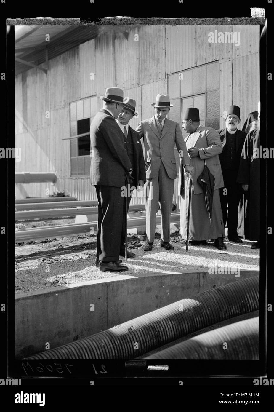 The photograph captures the opening day of Shell operations at Haifa ...