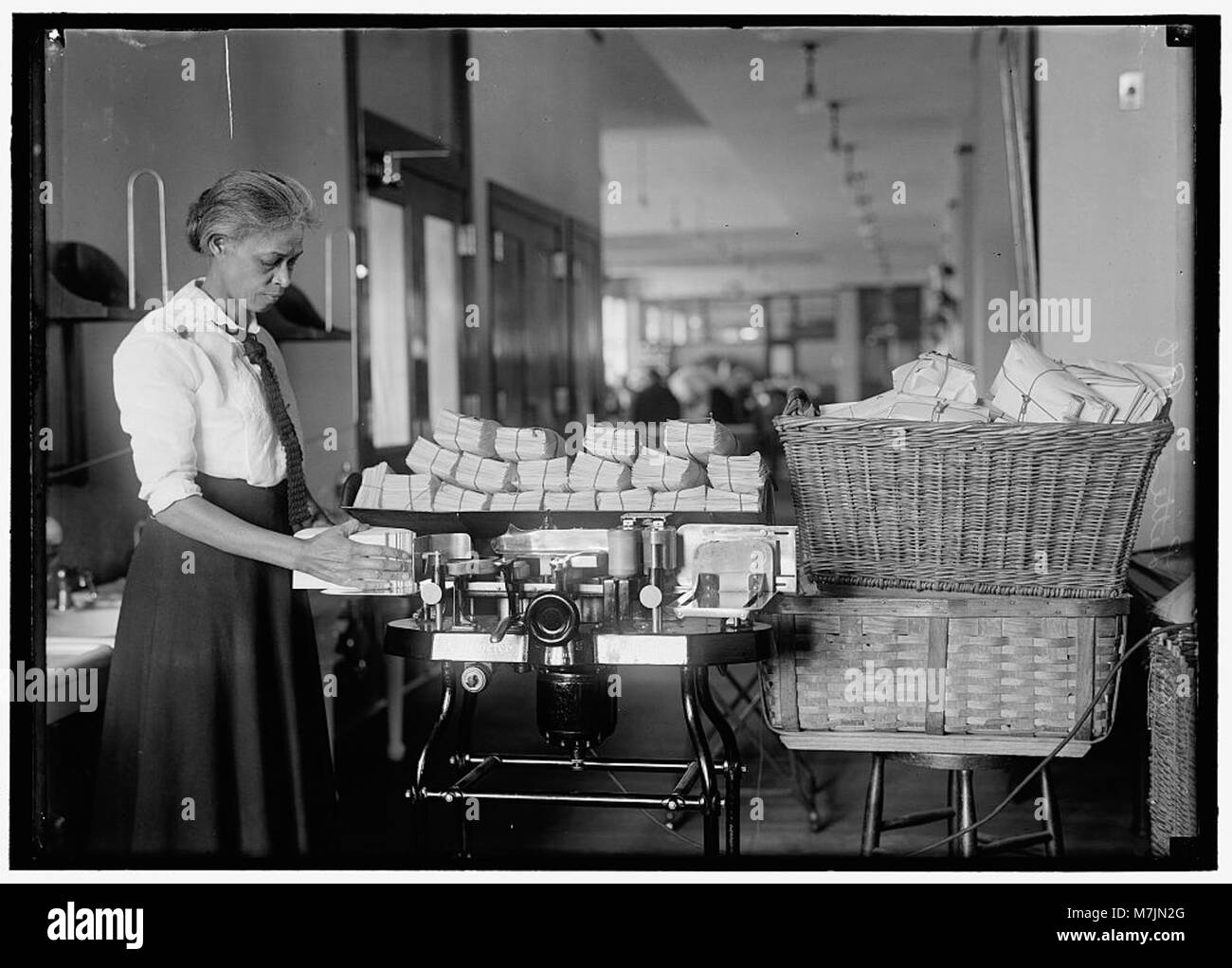 A historical photograph of the opening machine used by the U.S. Post ...