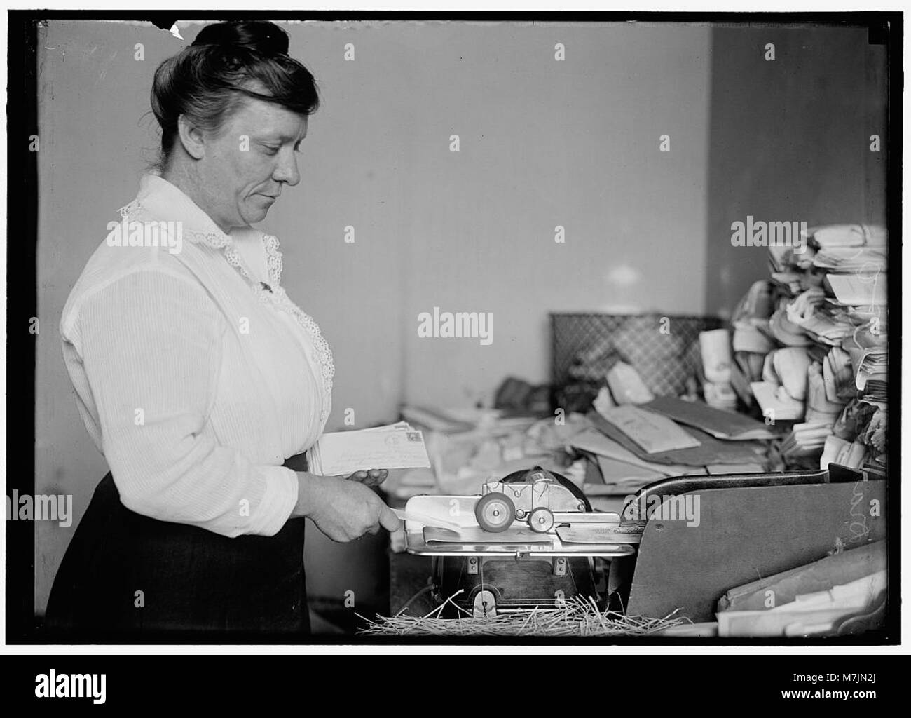 The sealing machine of the U.S. Post Office Department is depicted ...