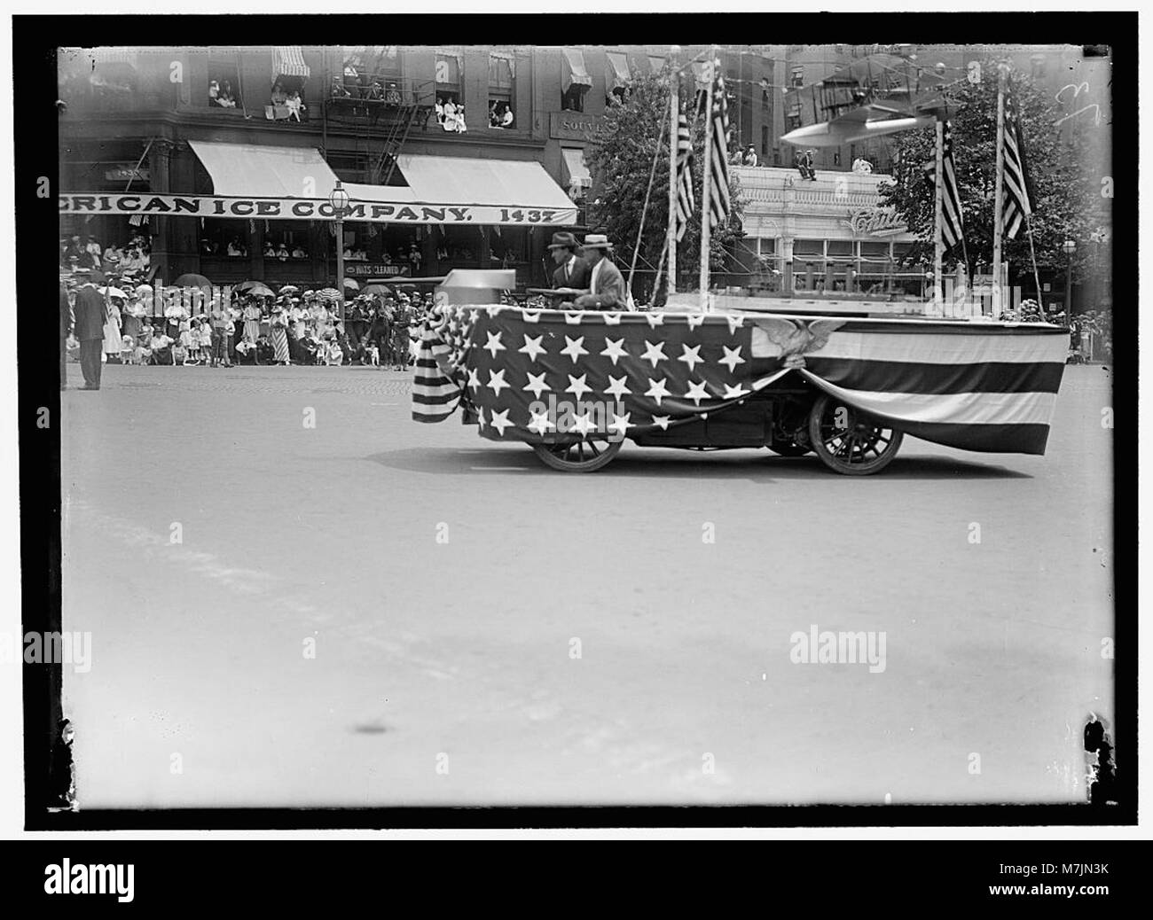 The Preparedness Parade, featuring a battleship and airplane float ...