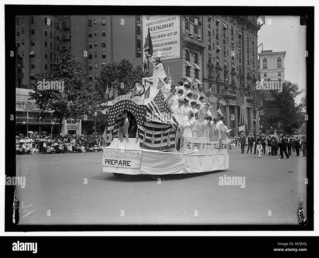 A preparedness parade is captured in this historical image, showcasing ...