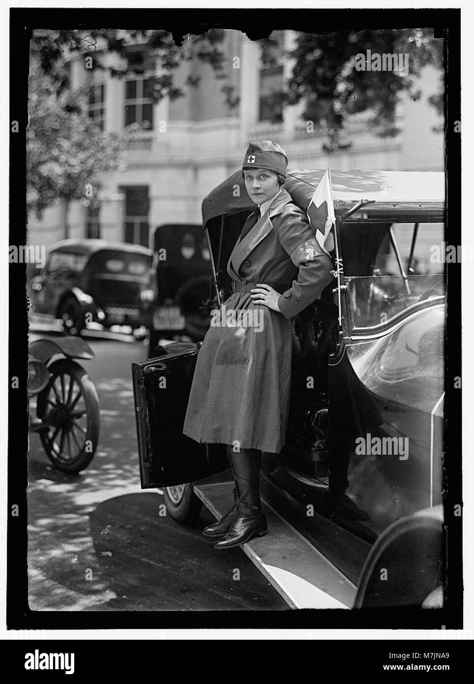 A photograph of the Red Cross Motor Corps groups, featuring members in ...