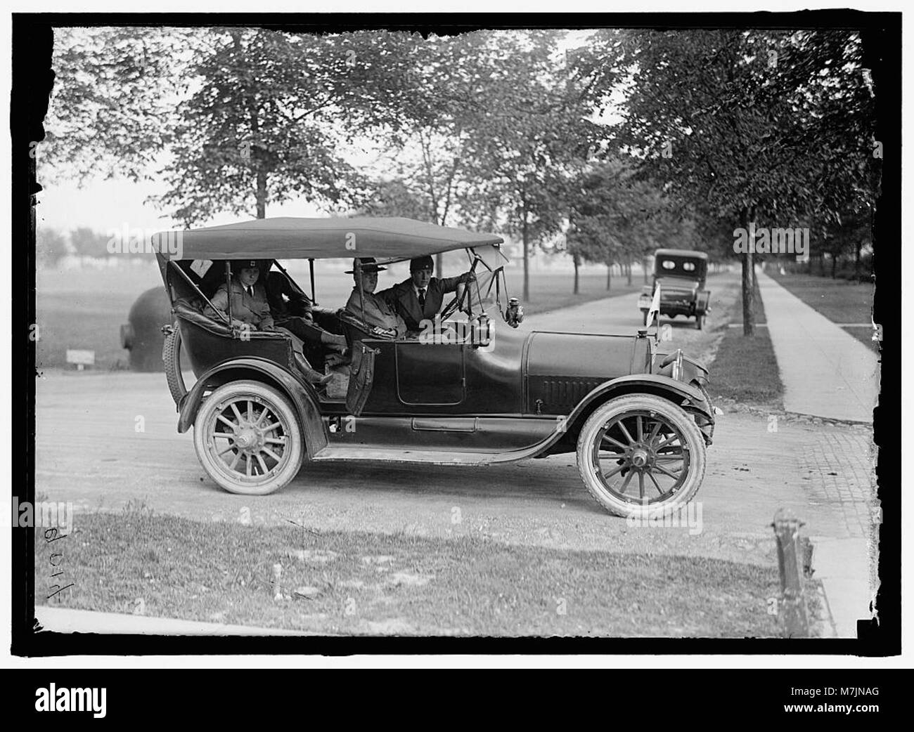 A historical photograph of the Red Cross Motor Corps, showcasing a ...