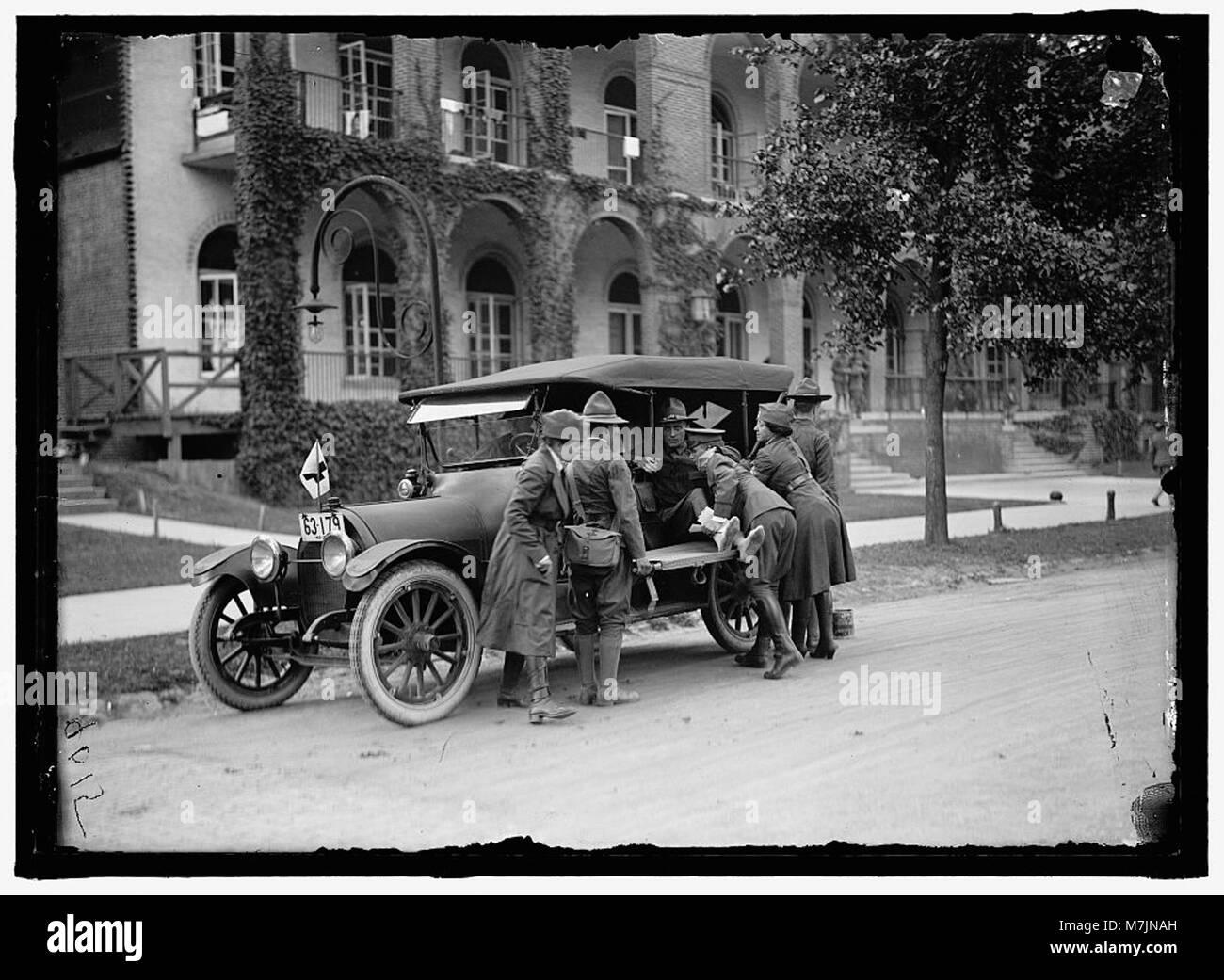 A photograph of various groups from the Red Cross Motor Corps, showing ...