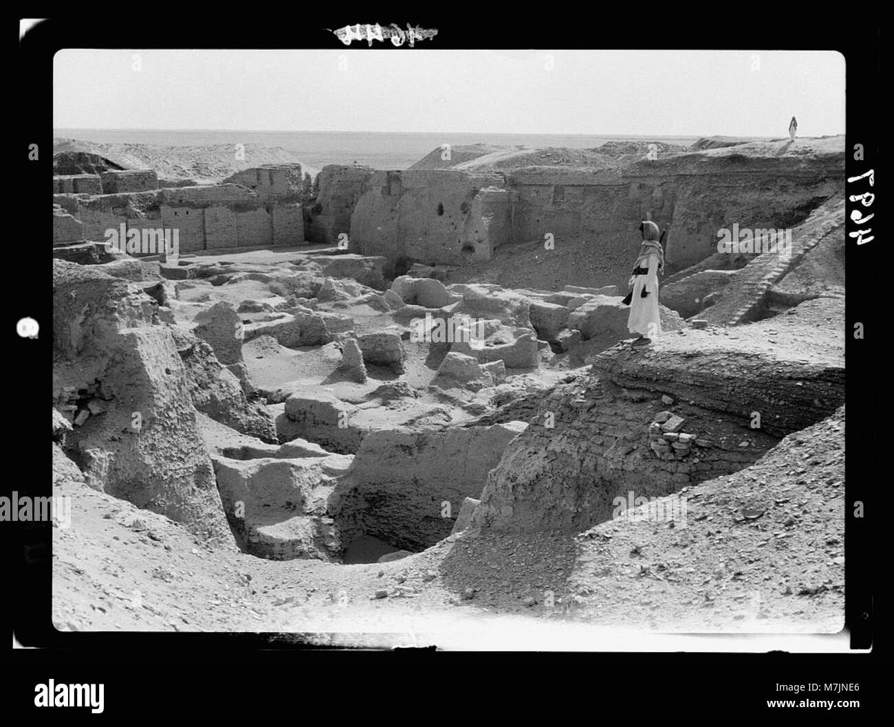 This photograph shows the ruins of Ur, an ancient city in Mesopotamia ...