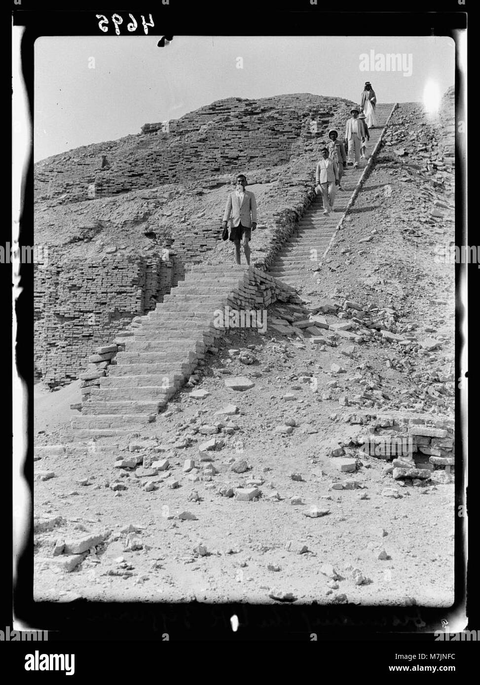 A photograph showing the narrow stairway leading down from the Ziggurat ...