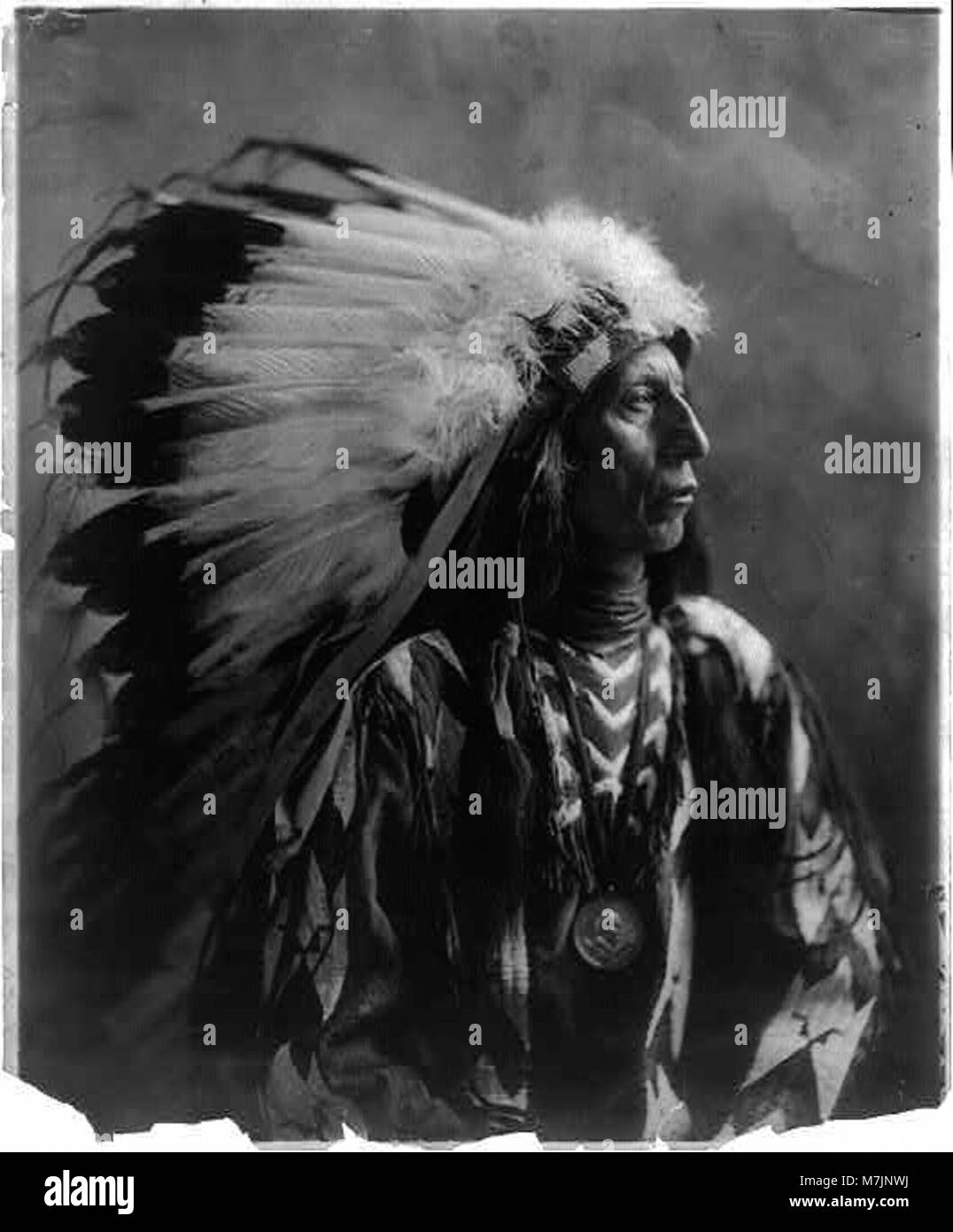 A portrait of Jack Red Cloud, a Native American figure, showing him in ...