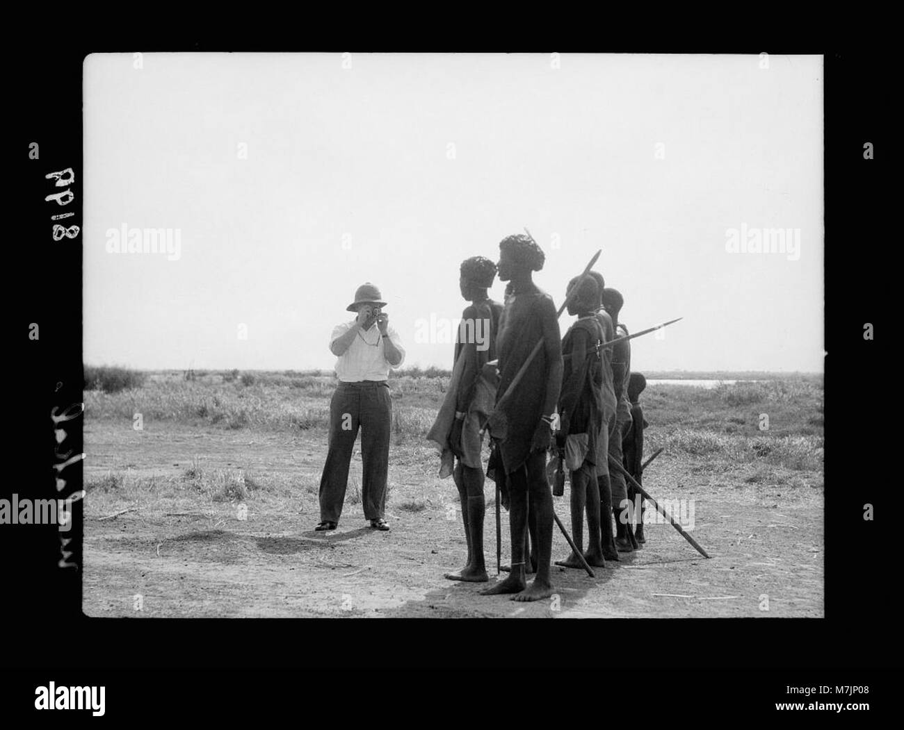This image shows passengers photographing Shiluki youths in Malakal ...