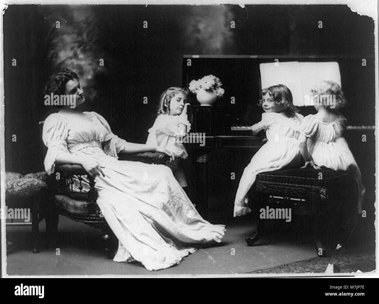 This photograph captures a musical duet, likely performed by two ...