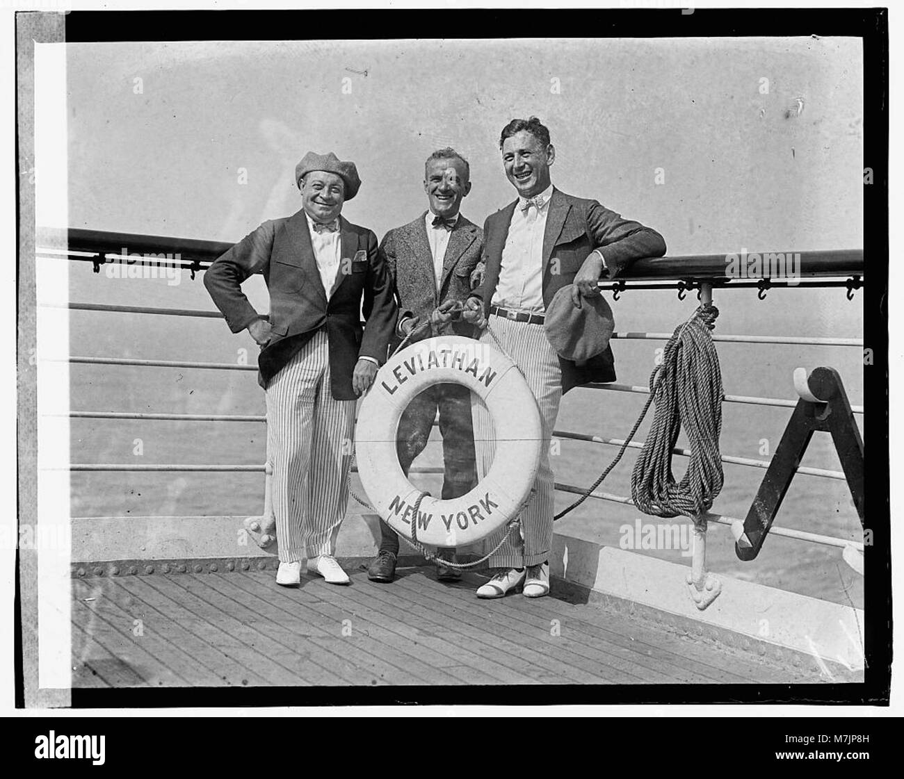 A photograph showing three men aboard the 'Leviathan,' a prominent ...