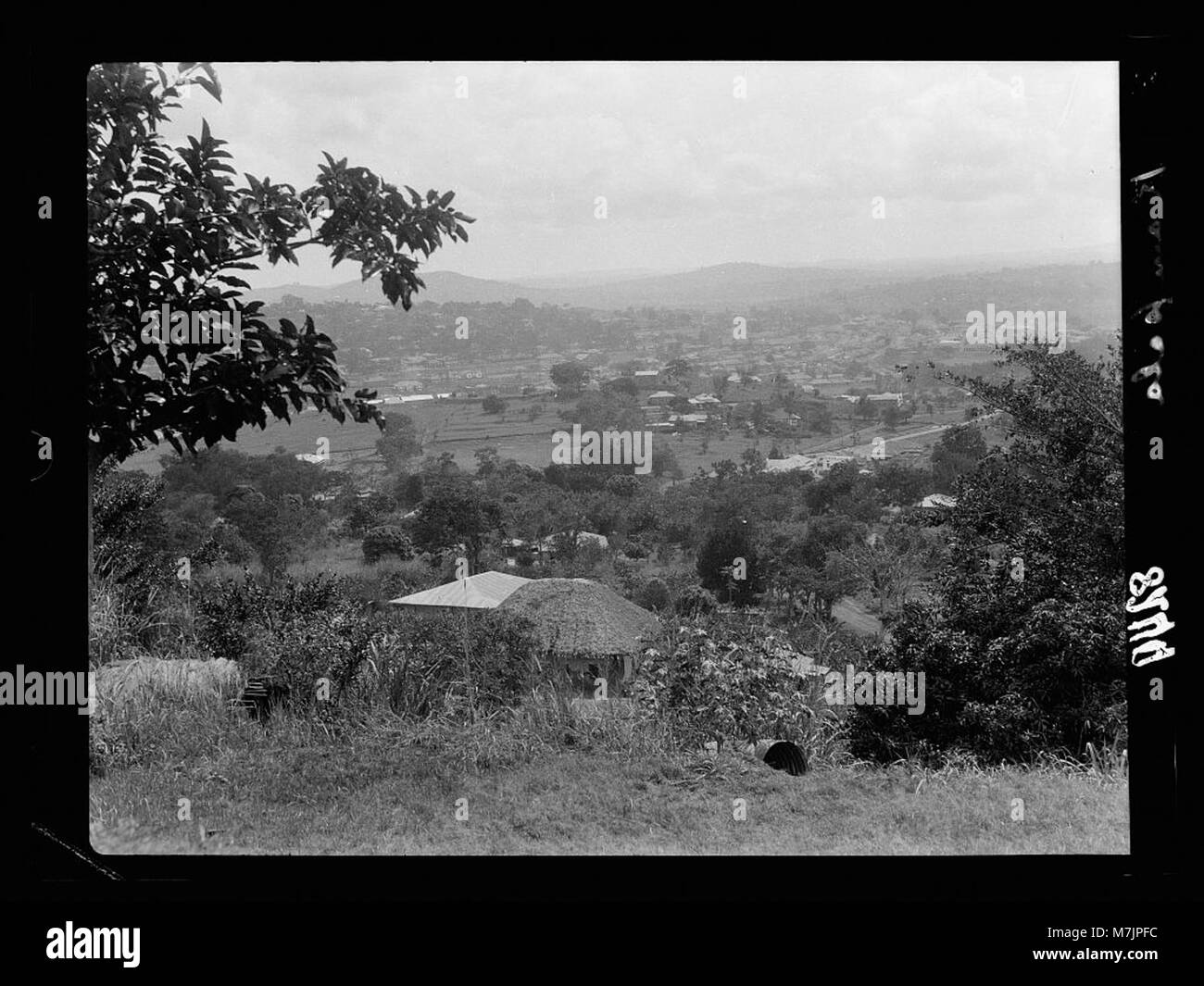 This photograph captures a panoramic view of Kampala, Uganda, from ...