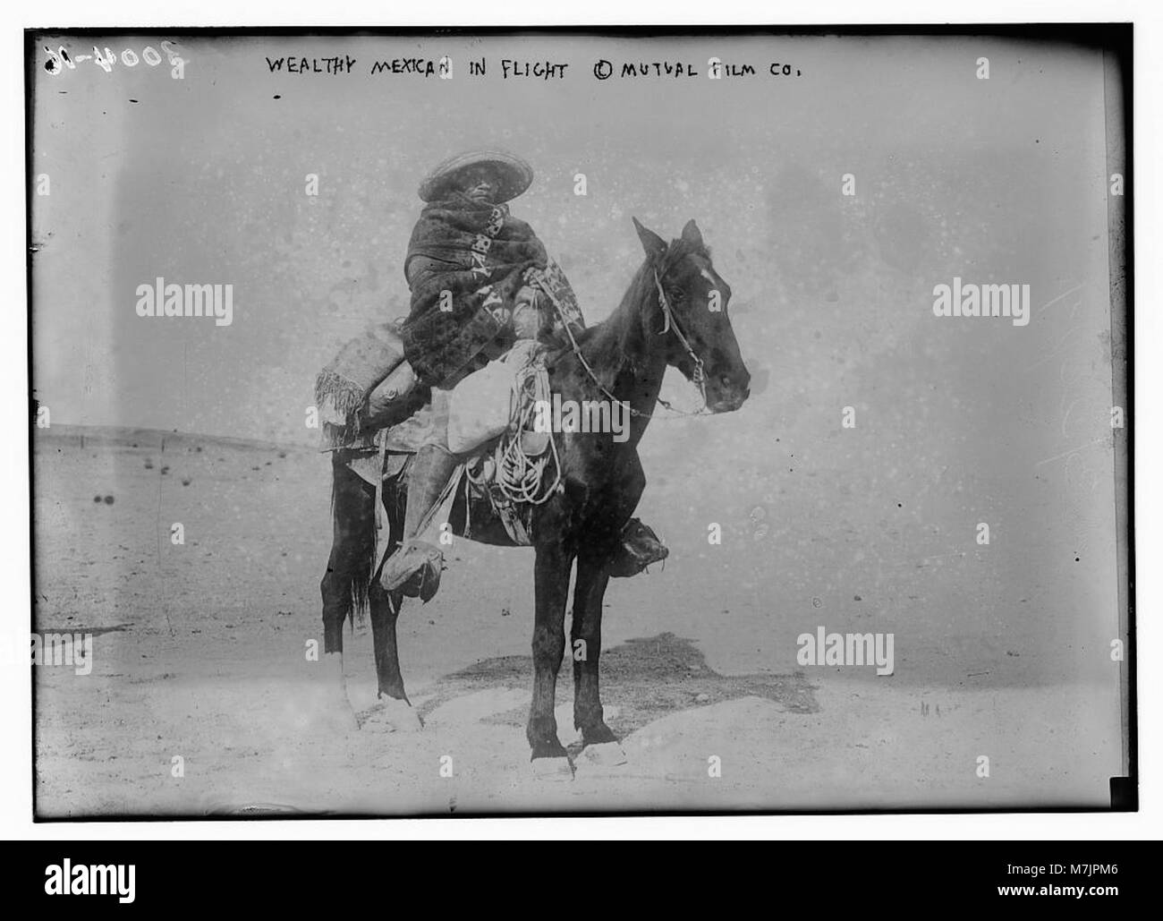 This photograph depicts a wealthy Mexican individual in flight ...