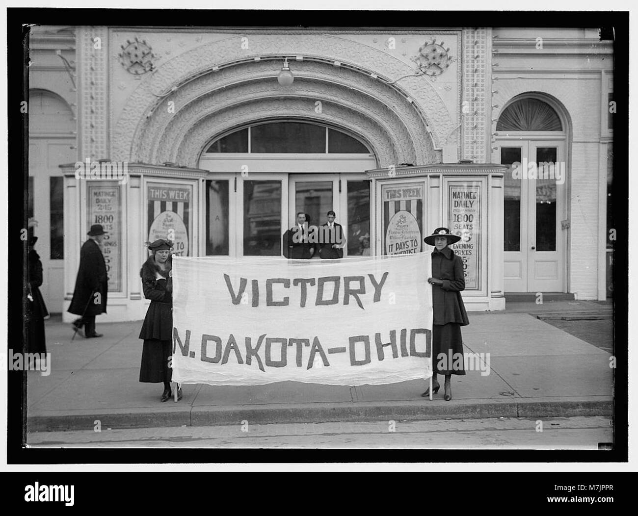 A historic photograph of women celebrating the victory of woman ...