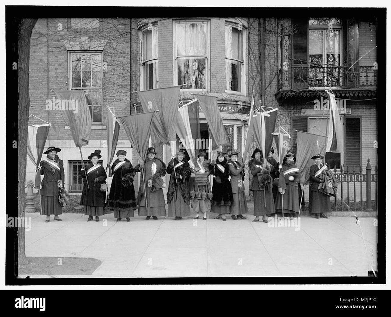 A photograph illustrating the woman suffrage movement, depicting women ...