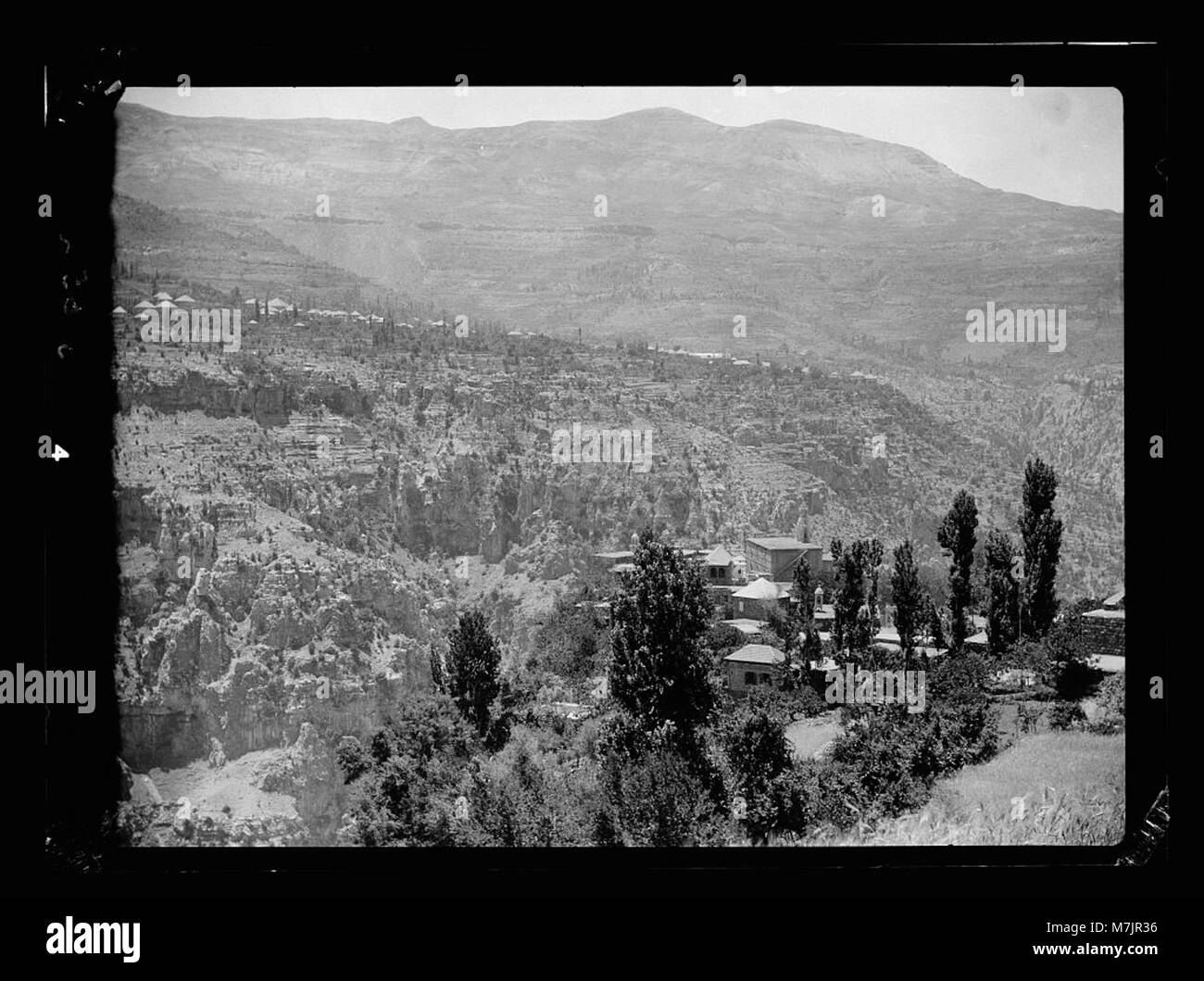 This photograph shows the village of Ehden in Lebanon, nestled among ...