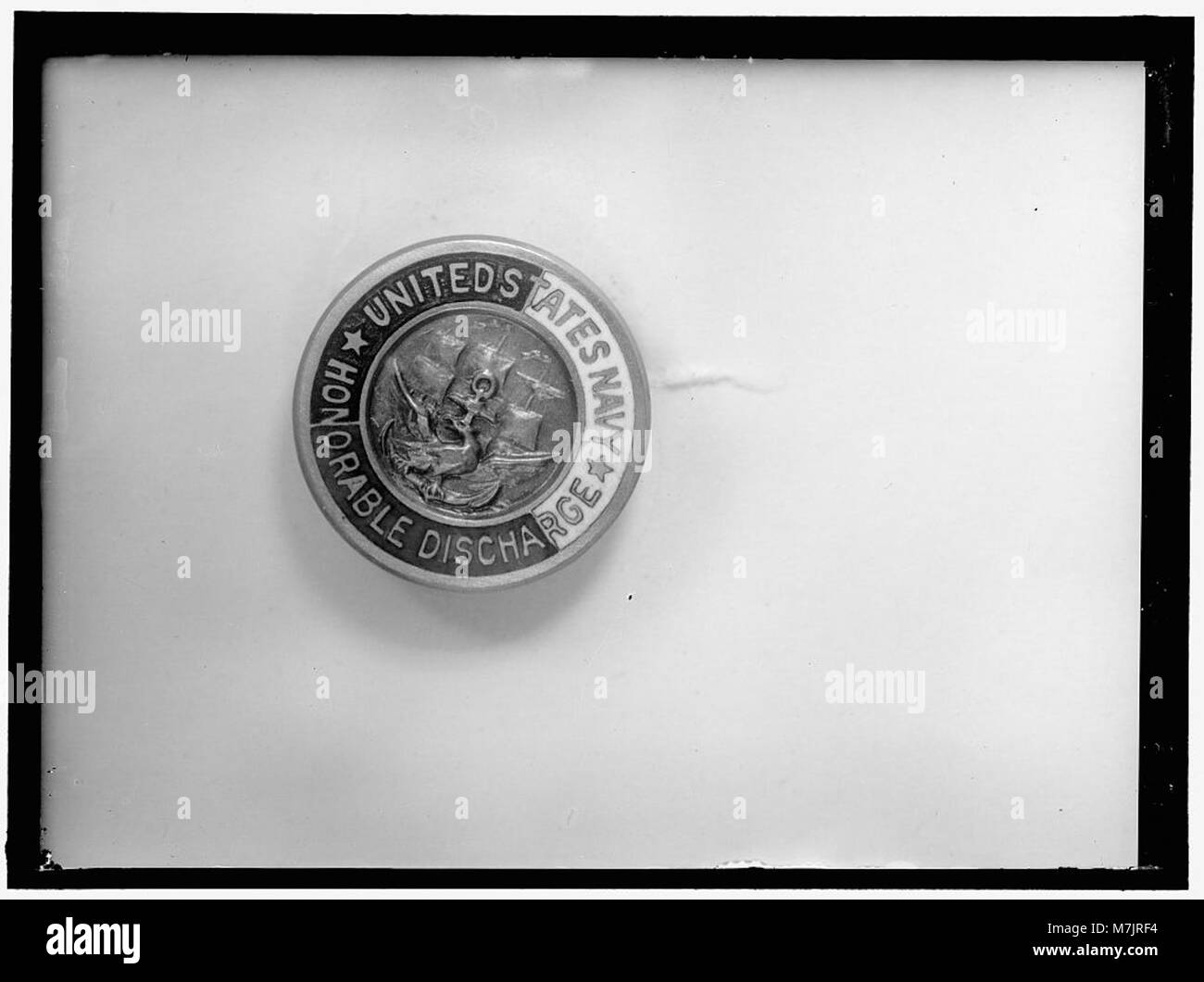 The Navy Honorable Discharge button is a military decoration awarded to ...