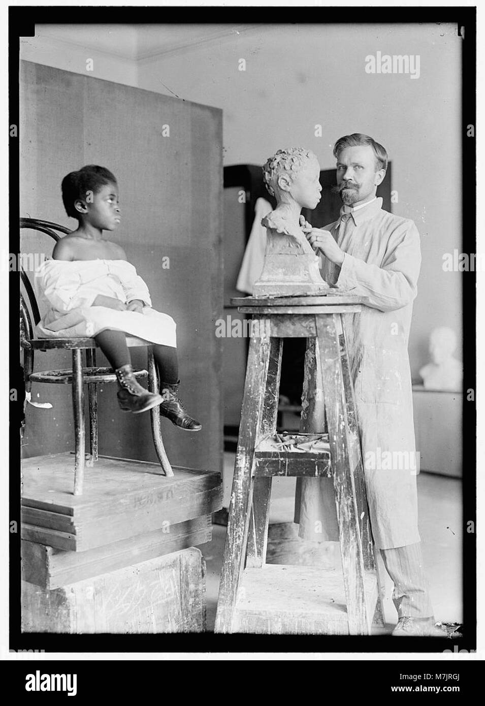 A portrait of Frank Mischa, a renowned sculptor, showcasing his ...