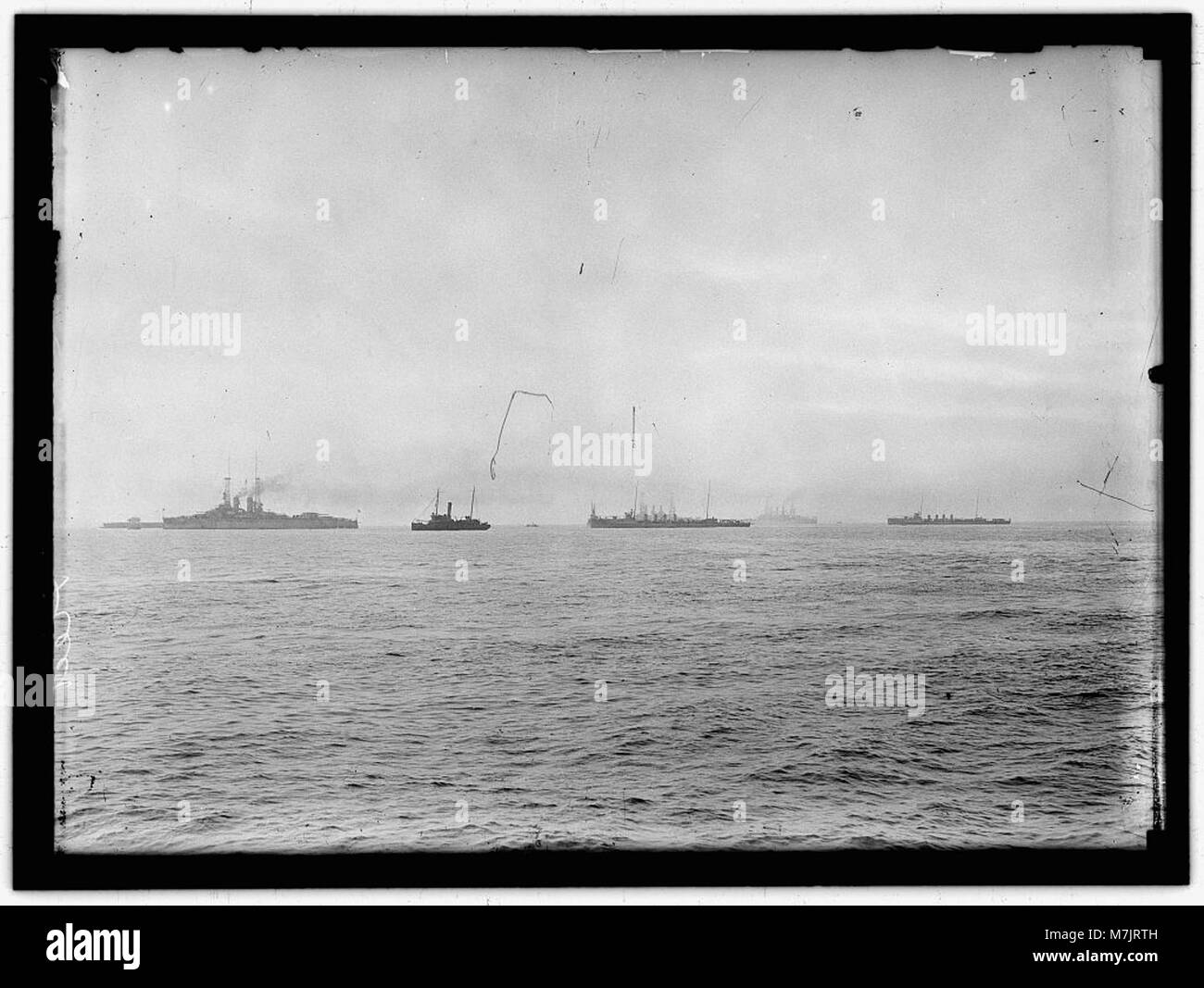 This image portrays the U.S. Navy fleet, showcasing naval vessels and ...