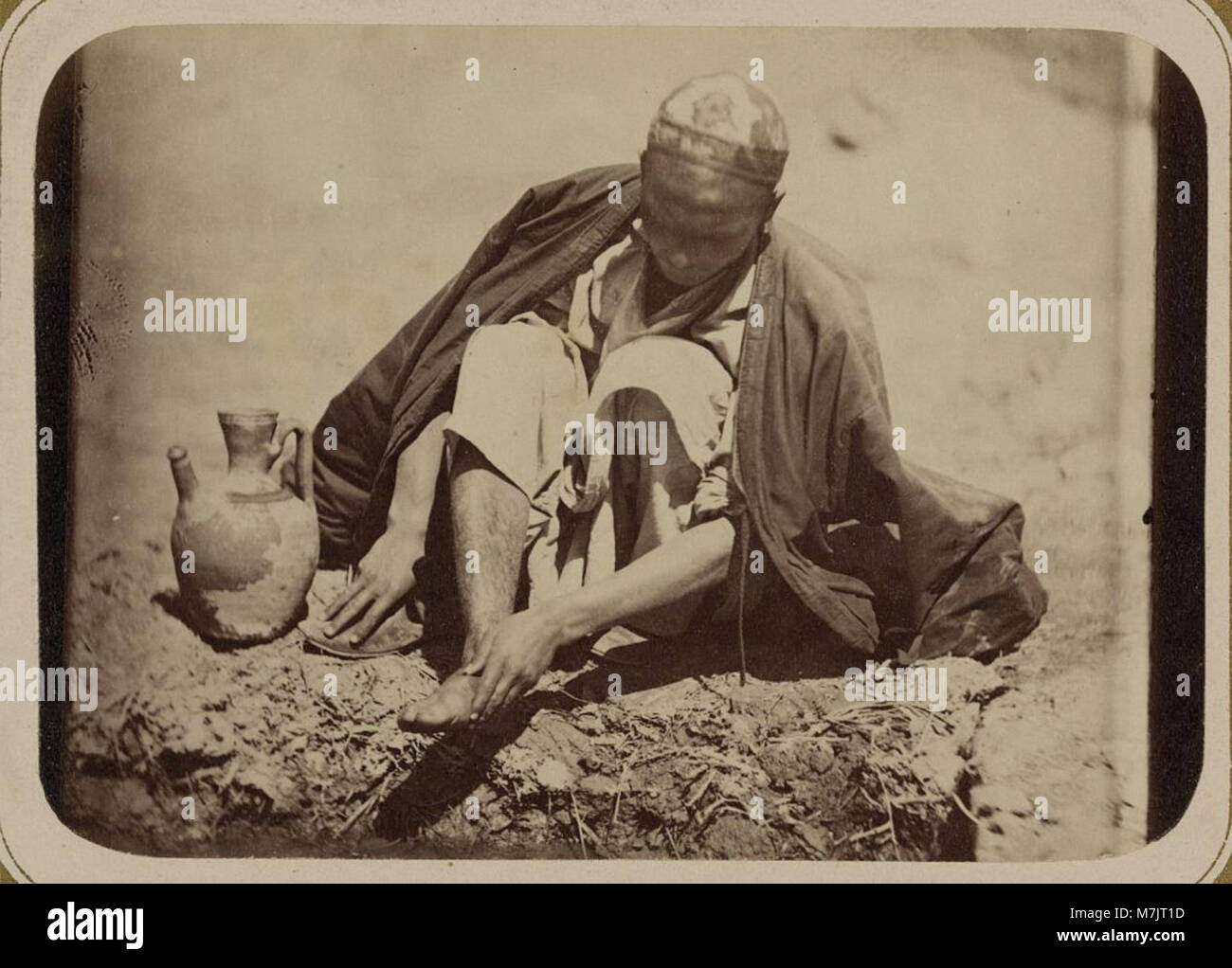 A photograph depicting Muslims performing the pre-prayer purification ...