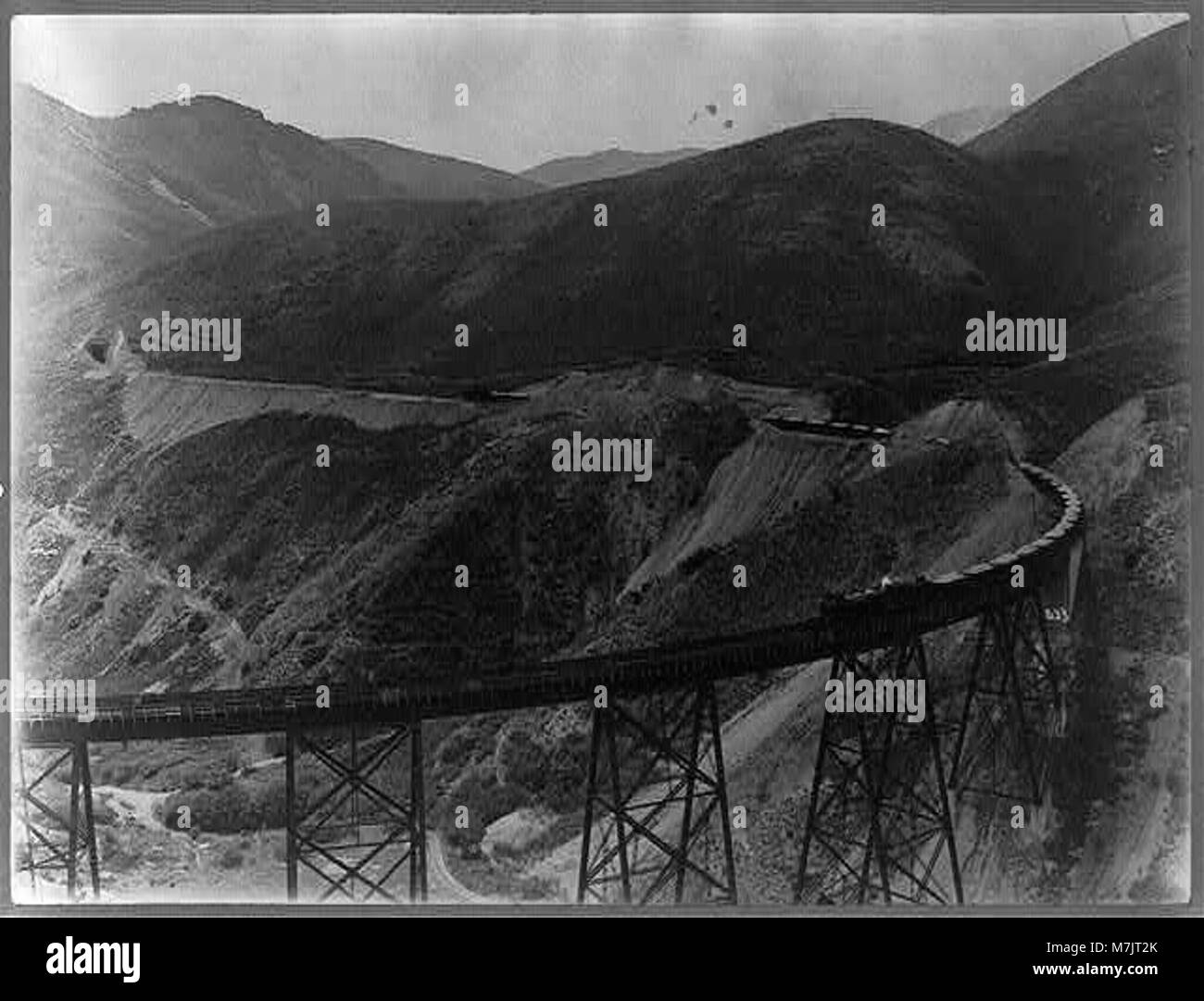 An ore train crosses the Dry Fork Bridge in Bingham, Utah, highlighting ...