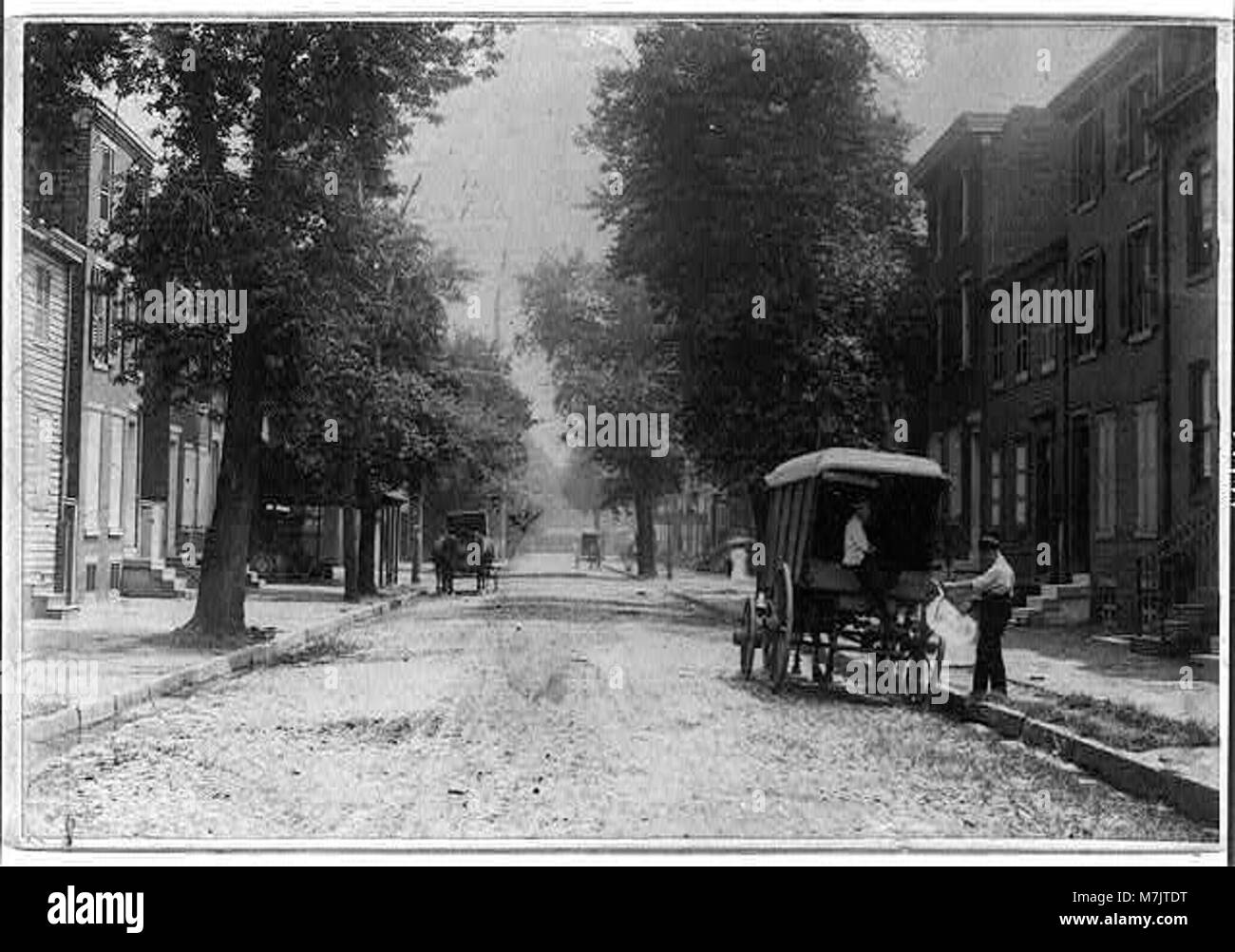 This photograph shows the residence of poet Walt Whitman, located on Mickle Street in Camden ...