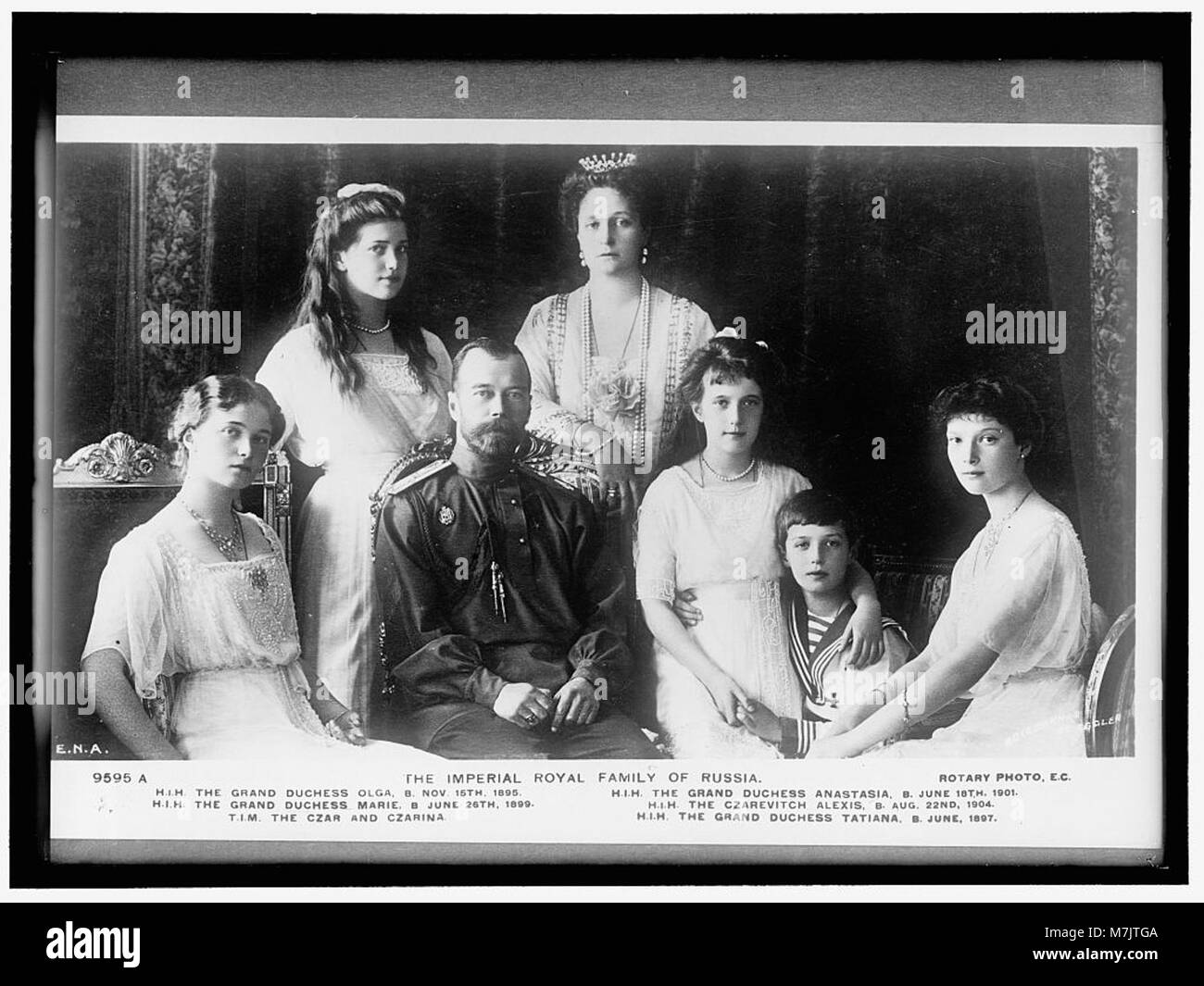 A formal photograph of the Russian Imperial Family. Seated are the Czar ...
