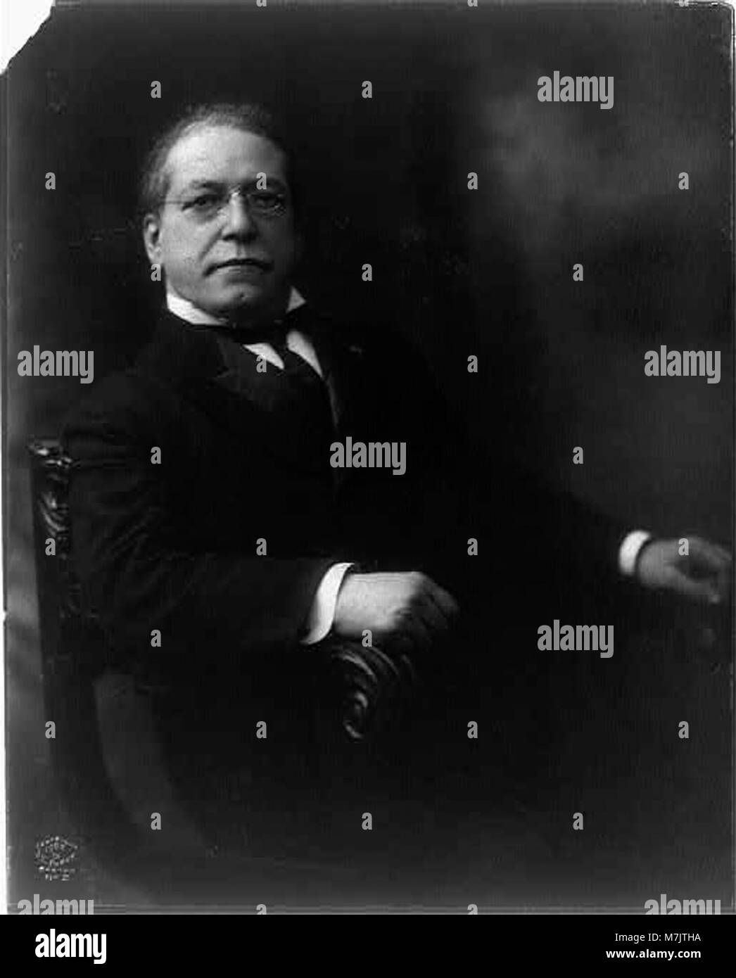 Samuel Gompers, a key figure in American labor history, is shown in ...