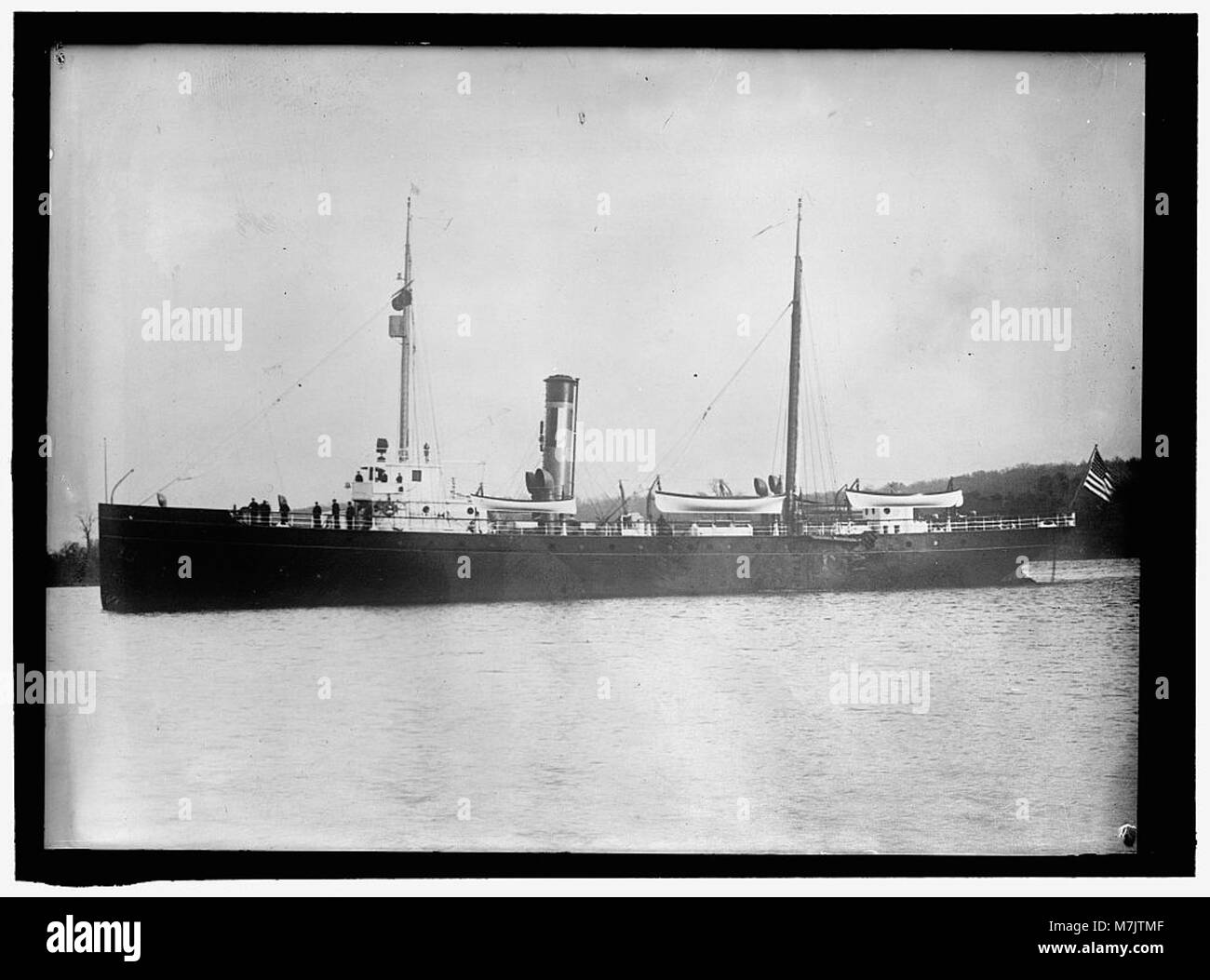 A collection of ships photographed, reflecting various naval vessels ...