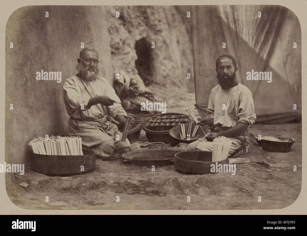 This image depicts the candle-making and soap production industry ...