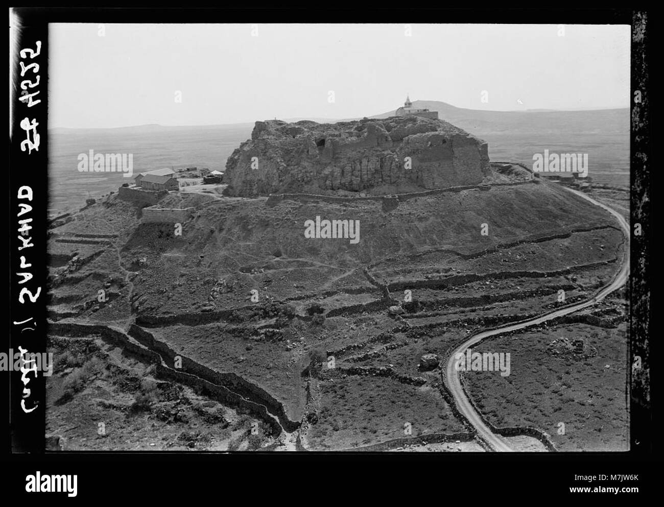 The photograph provides a detailed view of the Castle of Salkhad in the ...