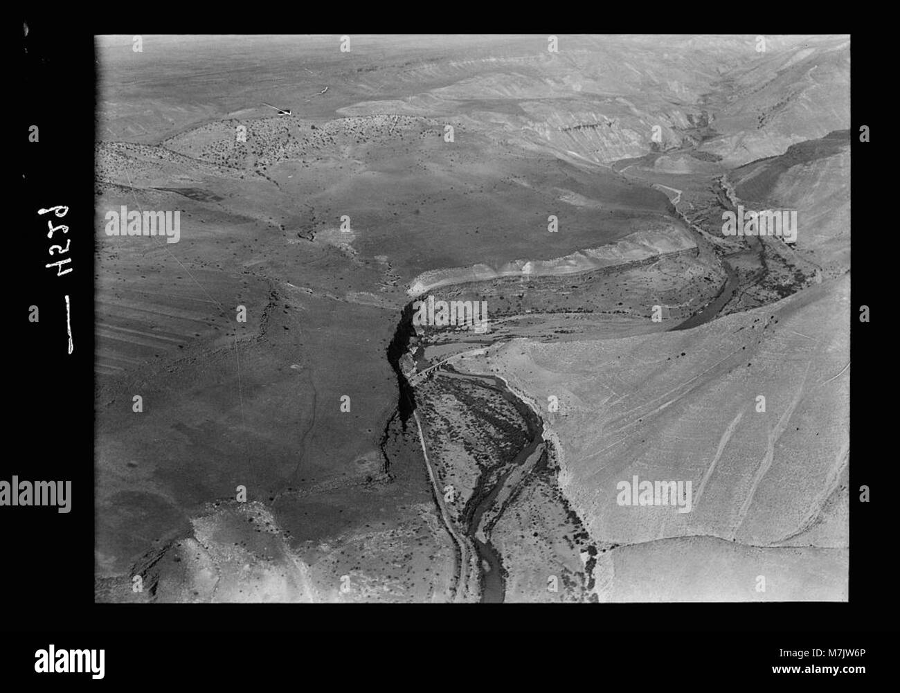A view of villages in the Hauran region of the Land of Gilead, showing ...